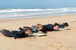 How to Teach Someone to Surf: Tips and Techniques for Beginners